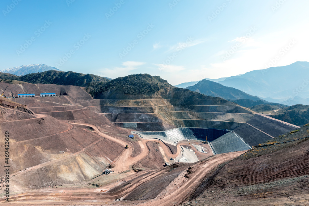 View of the industrial mine waste dam (tailing dam). A tailings dam is ...