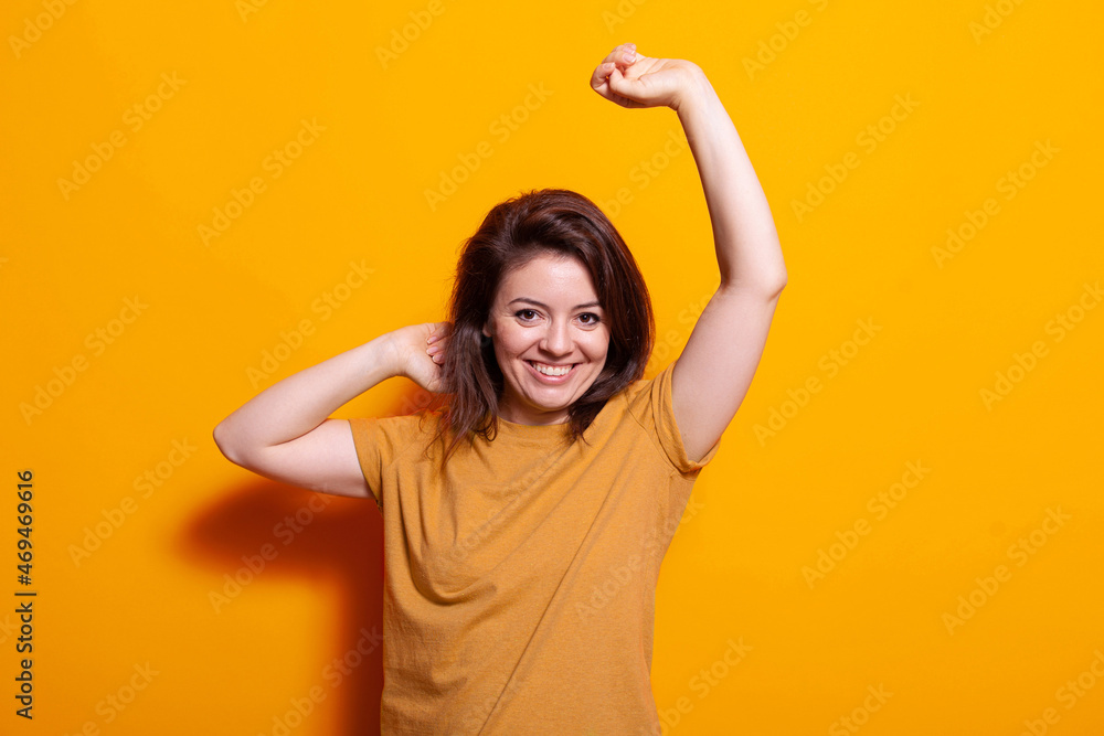 Happy person doing dance moves in front of camera, having fun with ...