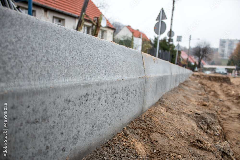 newly installed curb on the construction site Stock Photo | Adobe Stock