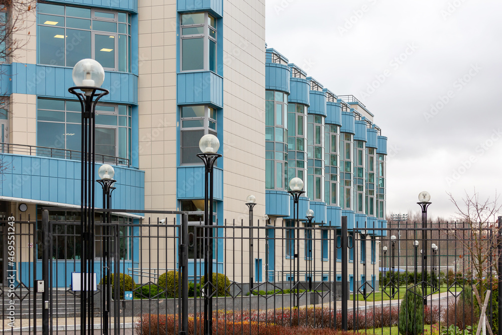The facade of a modern office building. A beautiful low-rise building ...