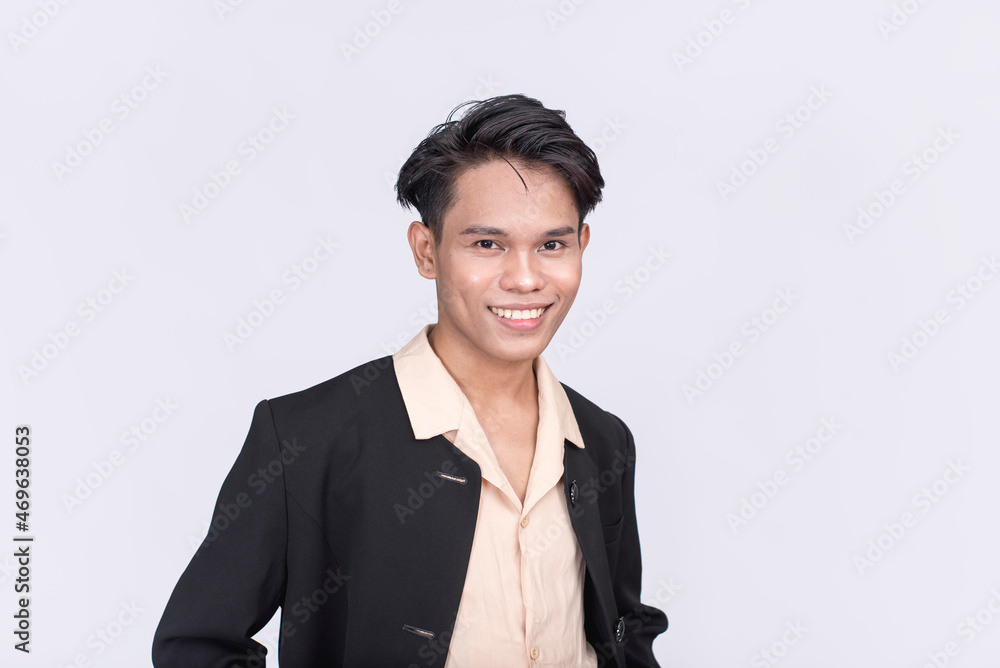Portrait of a handsome Filipino office employee in his early 20s ...