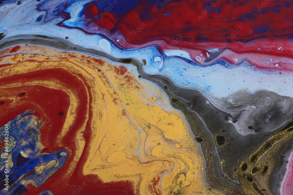 art photography of abstract marbleized effect background with red, gold ...