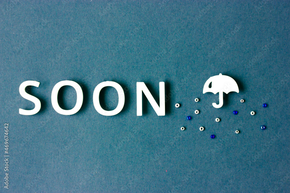 Rain soon words on a blue background. Open umbrella and raindrops ...