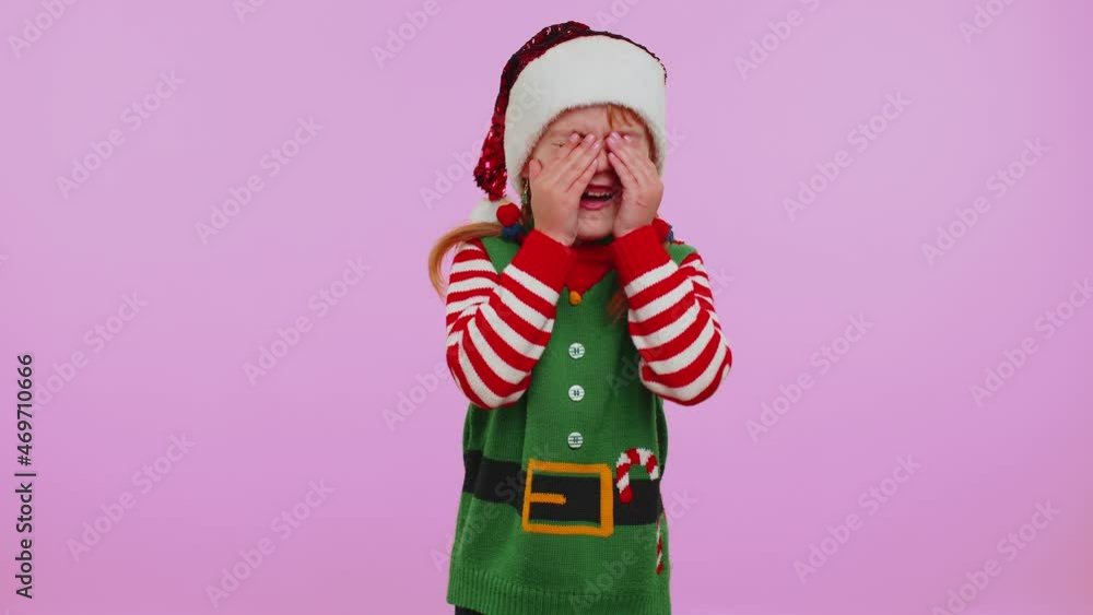 Upset disappointed girl in Christmas Santa Claus helper Elf costume ...