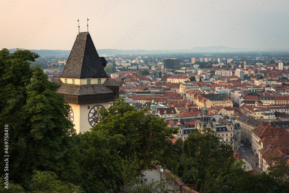 Graz panorama with the famous clock tower (Uhrturm) on Schlossberg Park ...