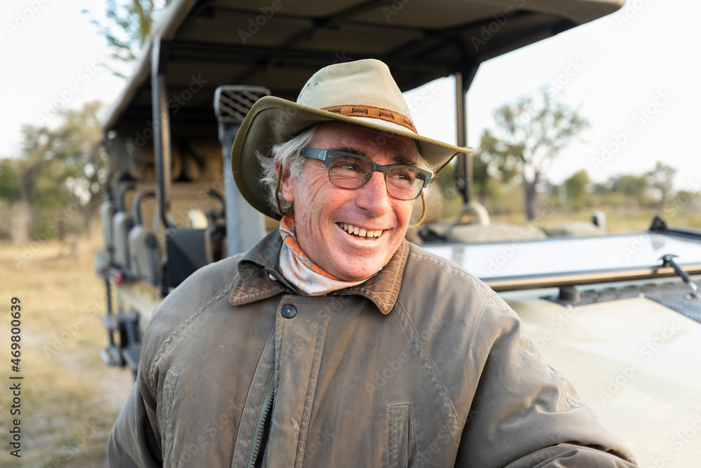 Smiling safari guide, Okavango Delta, Botswana Stock Photo | Adobe Stock