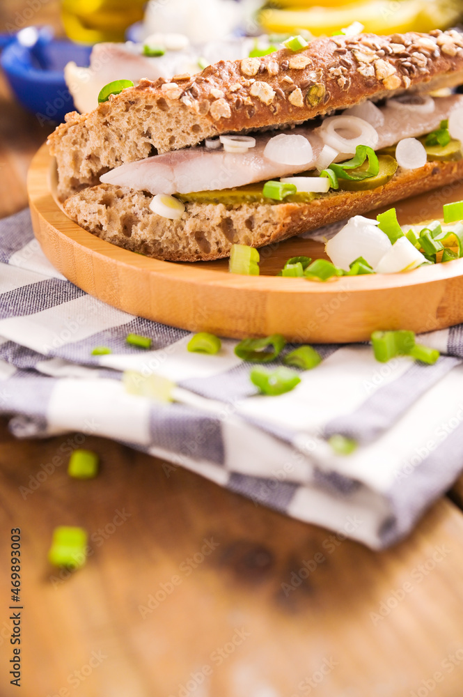 Dutch herring. Toast with Dutch herring, onions, pickles. Traditional ...
