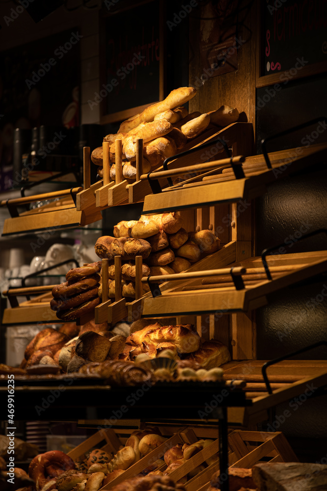 Delicious types of bread in the windows of a bakery shop. Multiple ...