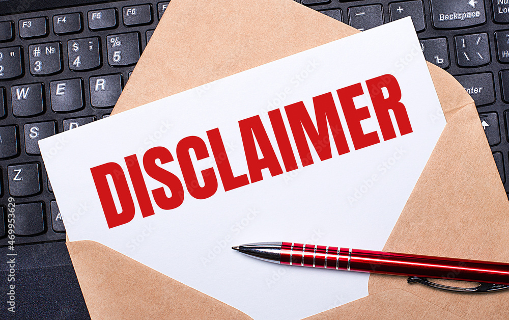 White card with the text DISCLAIMER in a craft envelope on a work desk ...