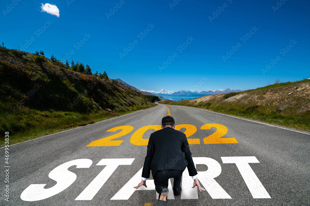 The 2022 New Year journey and future vision concept . Businessman ...