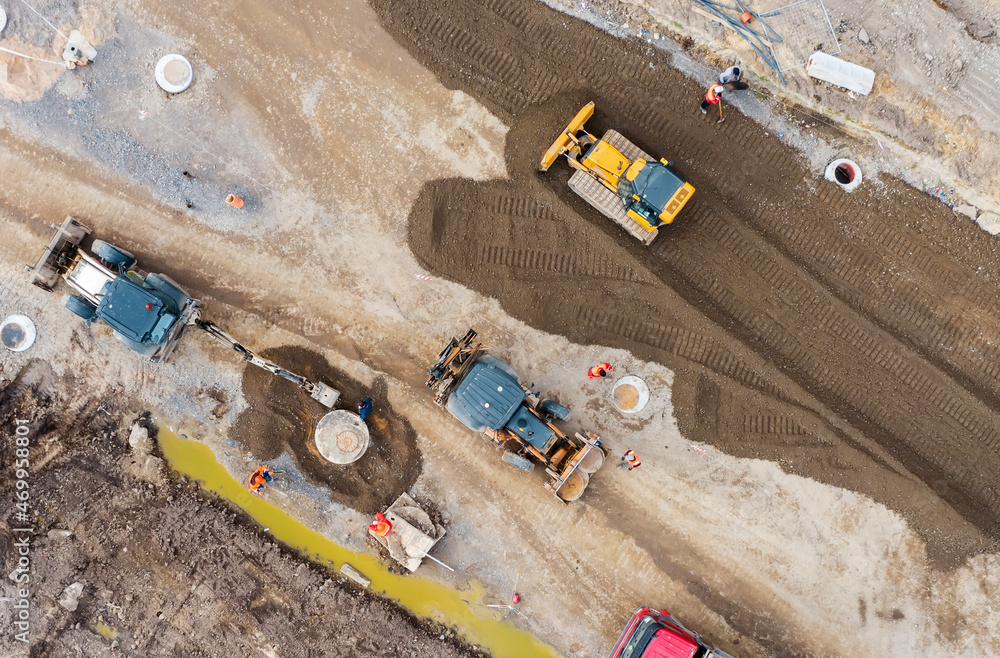 Construction of a city street, laying of communications, installation ...