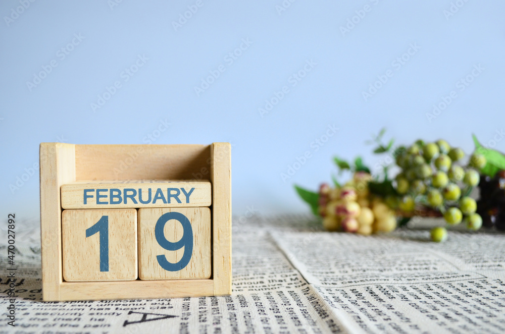 February 19, Calendar cover design with number cube with fruit on ...