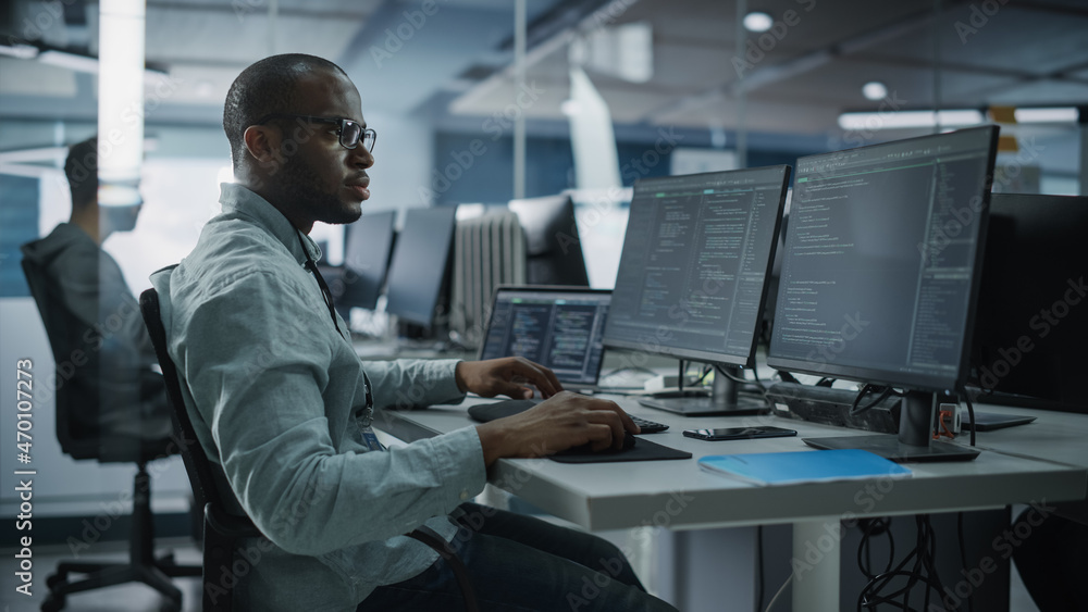 Authentic Office: Professional Black IT Programmer Working on Desktop ... Authentic Office: Professional Black IT Programmer Working on Desktop ...