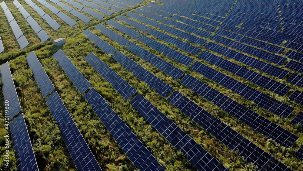 View of a solar power plant, rows of solar panels, solar panels, top ...