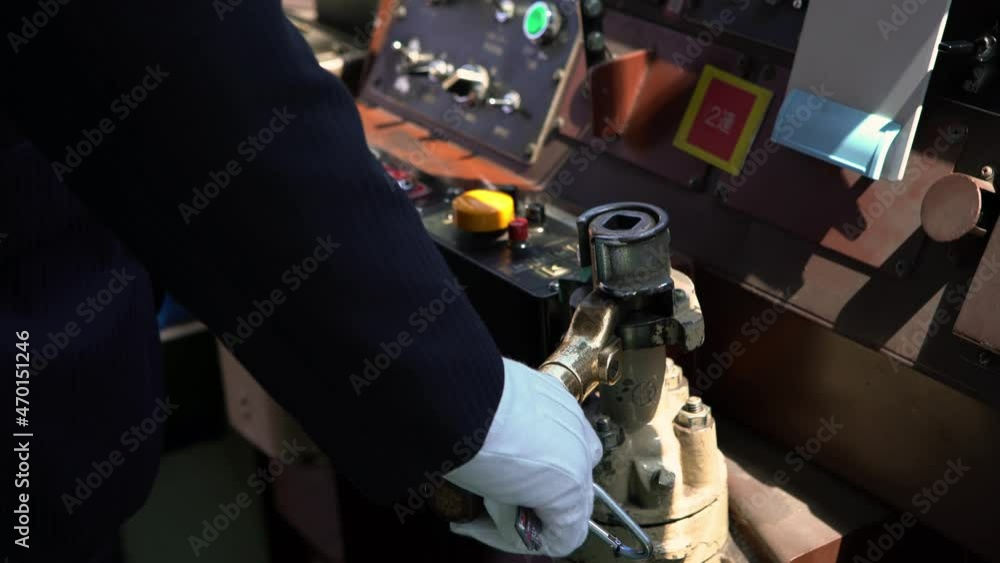 Operator on interior control place accelerates a Japanese local train ...