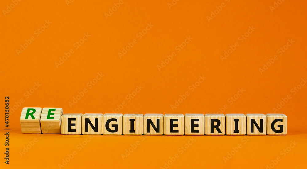 Engineering or reengineering symbol. Turned cubes and changed words ...