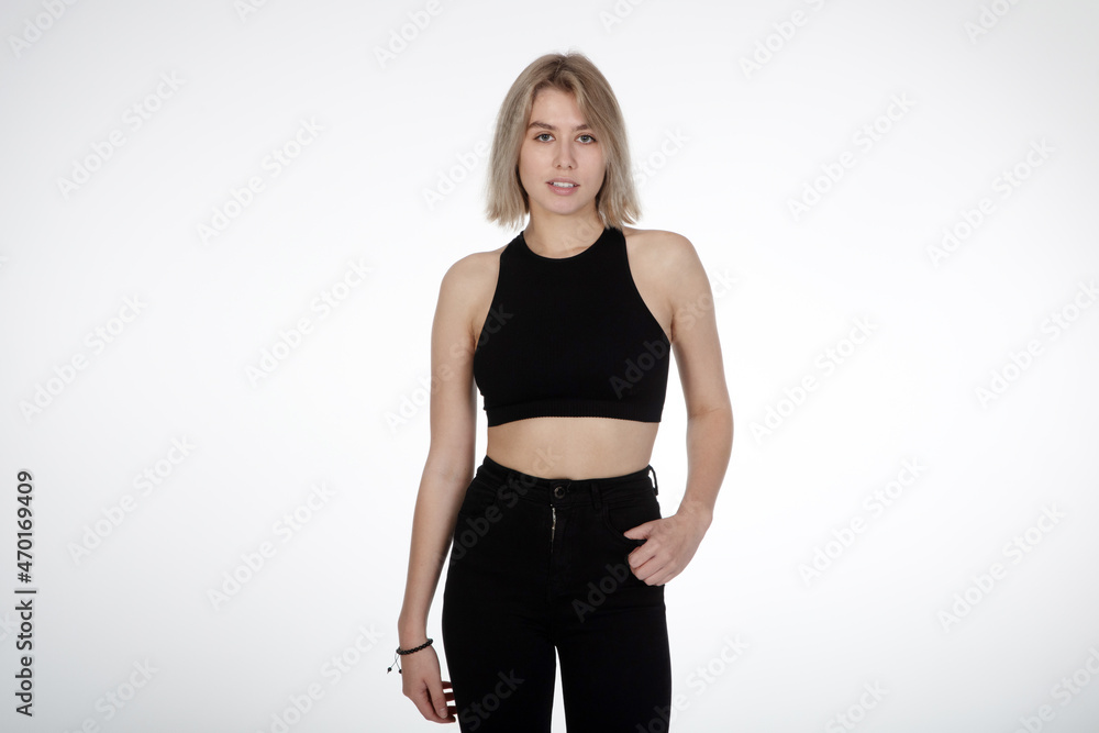 Sportliches Model in schwarzen Turnanzug Stock Photo | Adobe Stock