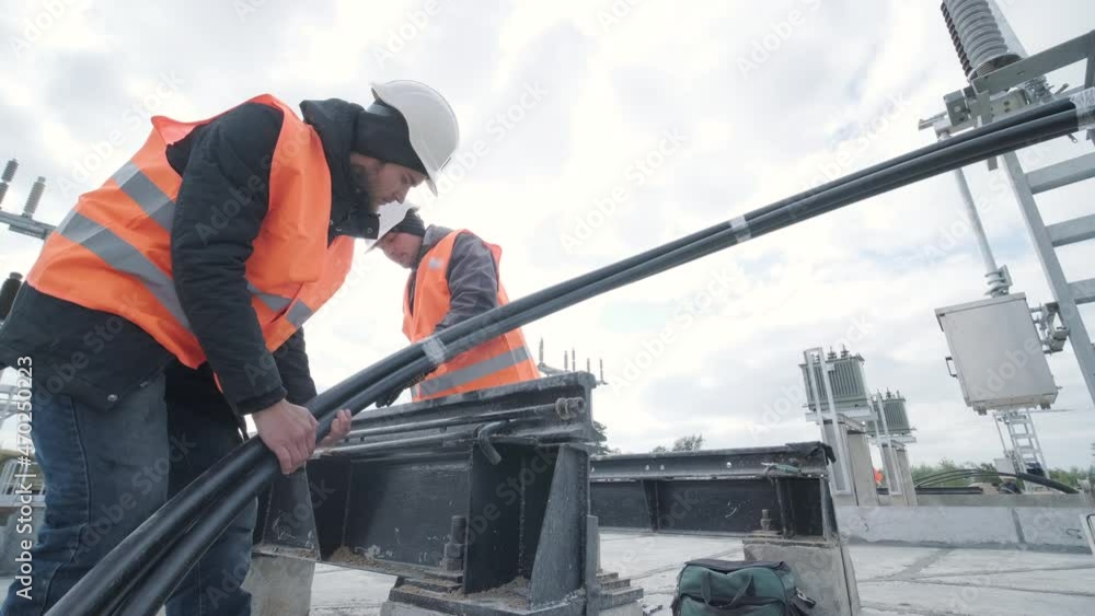 Installation work during the construction of a transformer substation ...