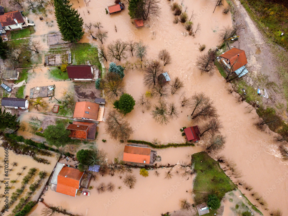 Aerial drone view of flooded villages, fields, farms and houses ...