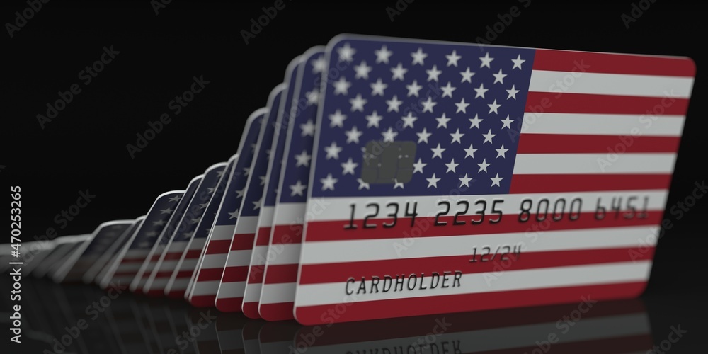 Domino effect, fallen credit cards with flags of the United States ...