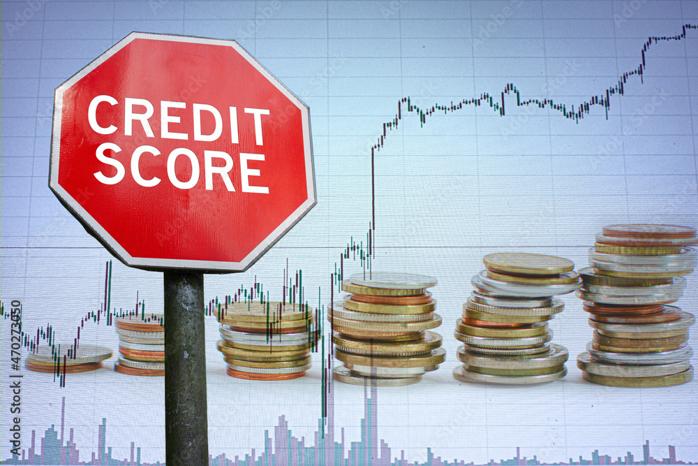 Credit score road sign on economy background with graph and coins ...