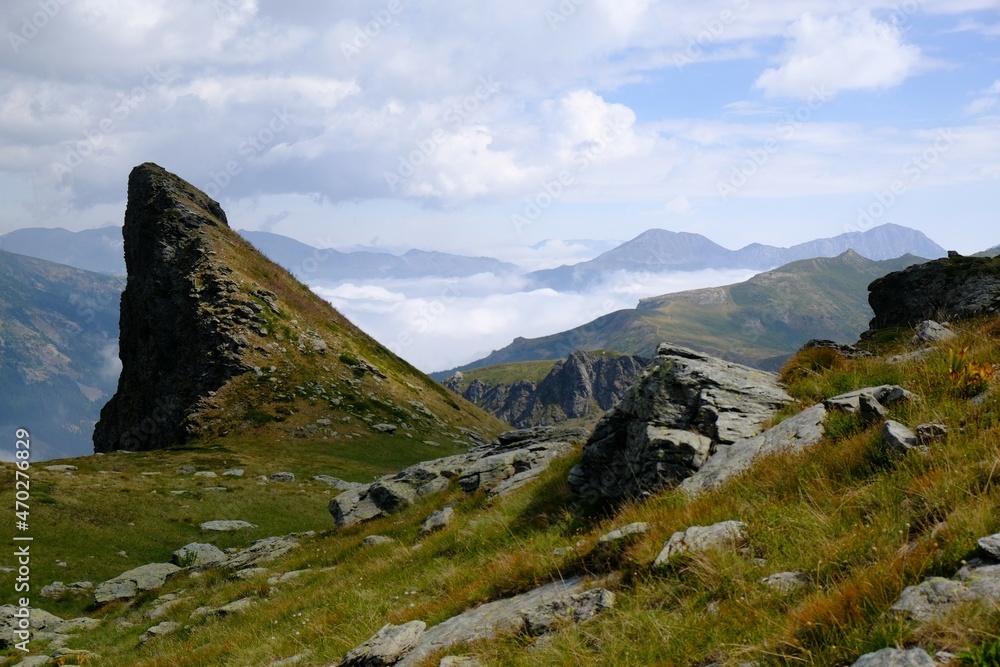 Beautiful mountain view above clouds during hiking on peak Djeravica ...