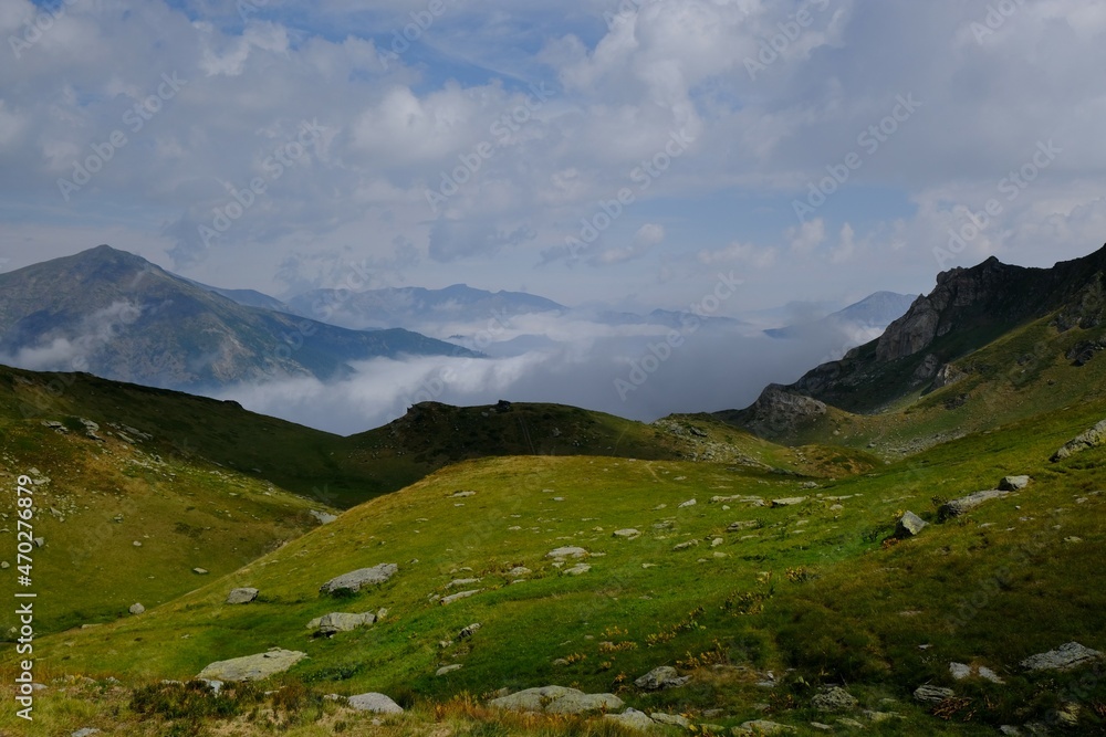 Beautiful mountain view above clouds during hiking on peak Djeravica ...