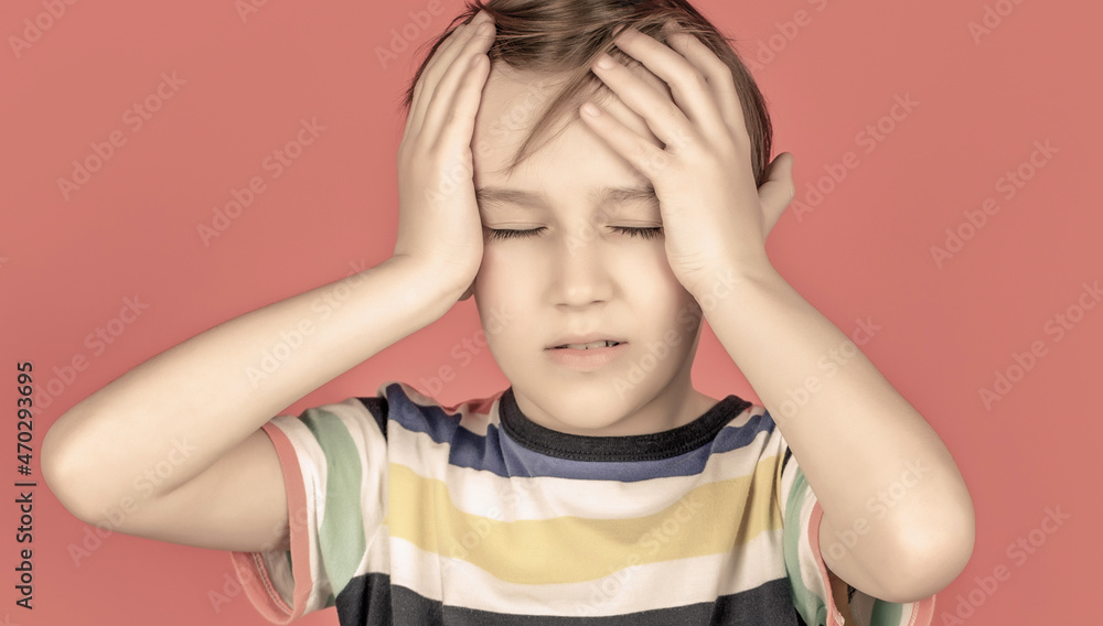 Headache child. Suffering migraine. Headache because stress. Portrait ...