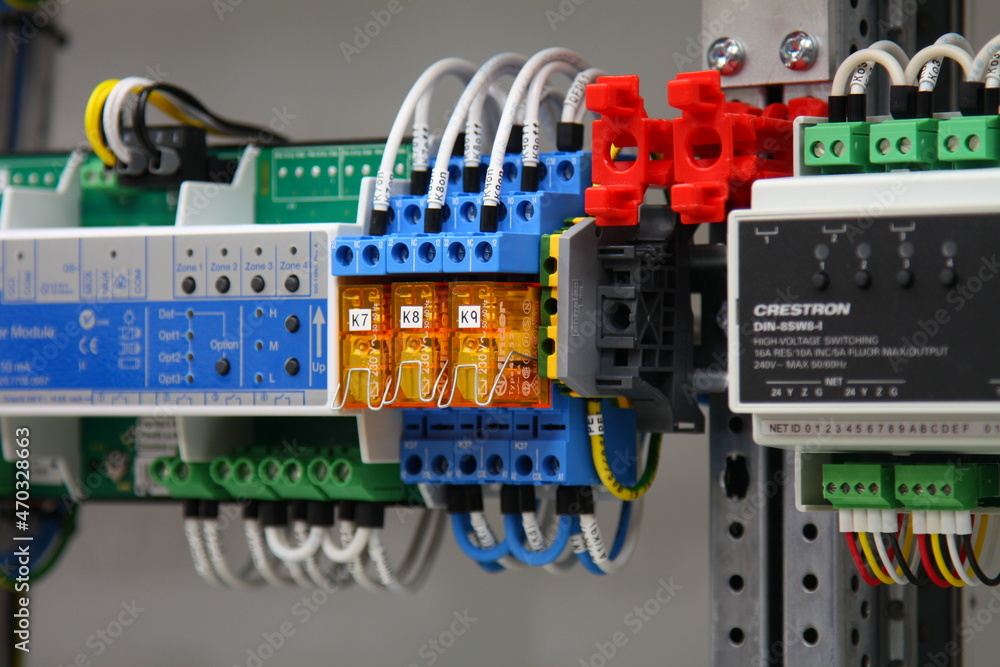 Automation modules installed on the din rail in the control panel for ...