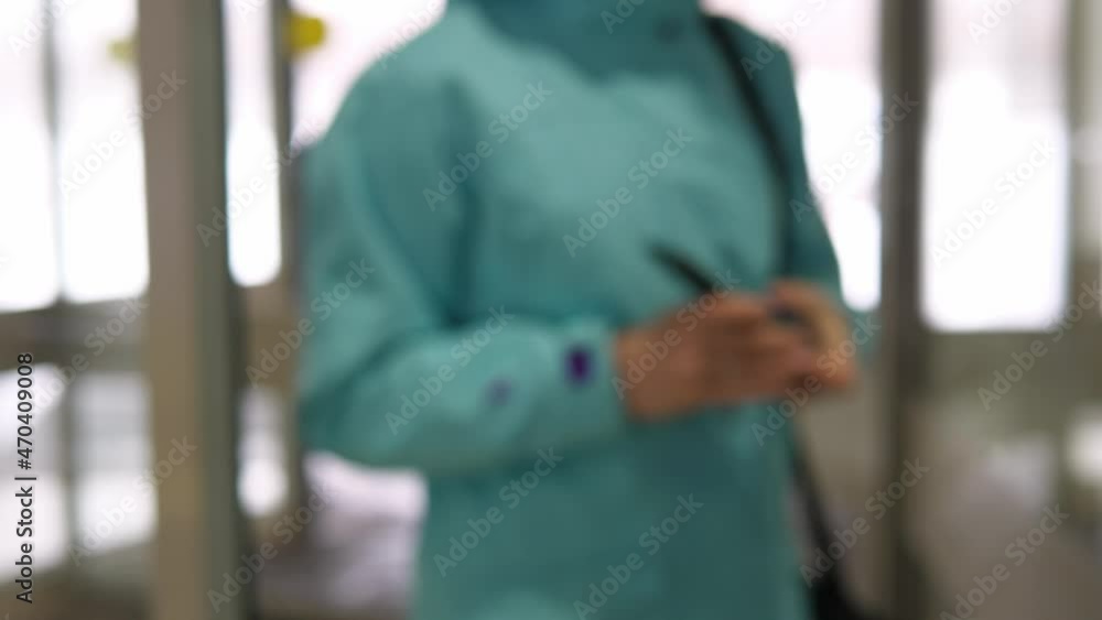 Reading a QR code using a smartphone. Using QR code to check COVID-19 ...