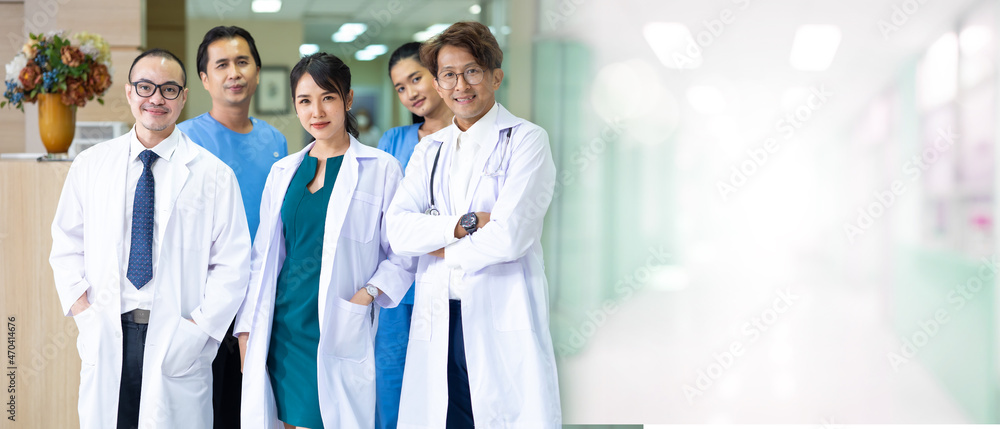 Group of asian doctors looking at camera. Mixed race professional ...