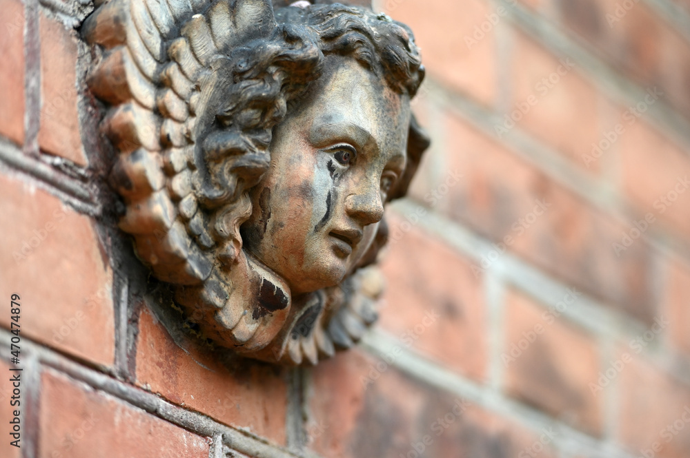 Partial view of an angel with a tear drop under her right eye. Stock ...