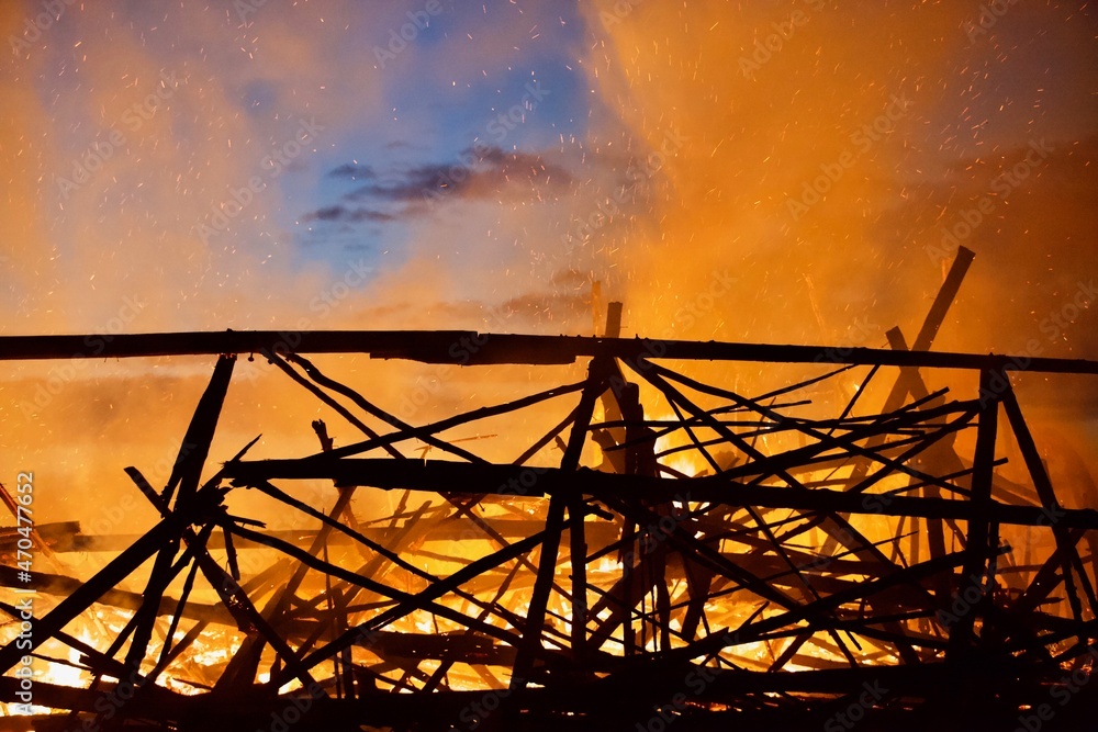 Burning wooden buildings close-up. Raging flames of fire. Firestorm ...