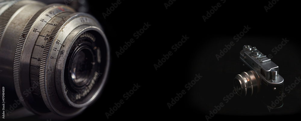 Horizontal banner with a retro film camera of the 20th century ...