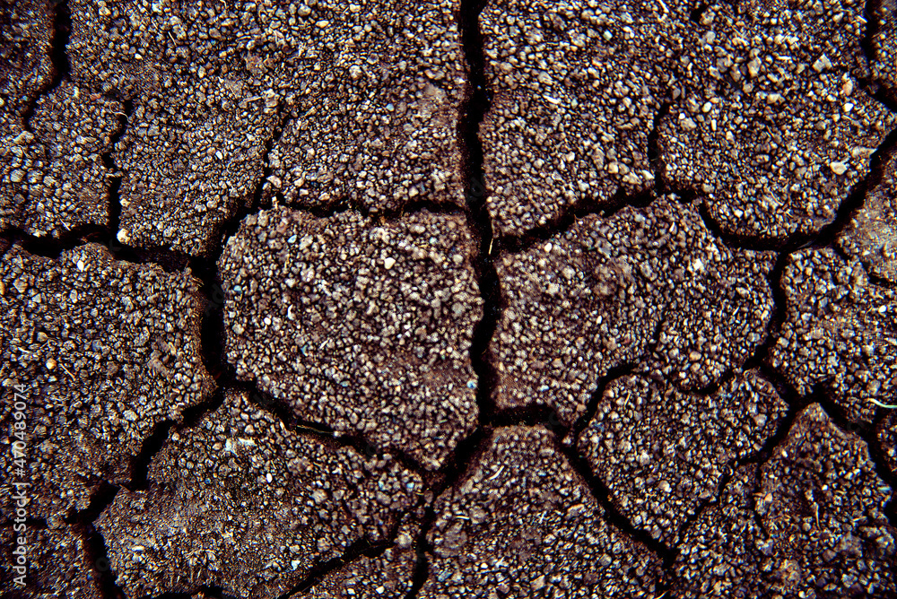 Dry cracked ground during drought. Gray dried and cracked ground earth ...