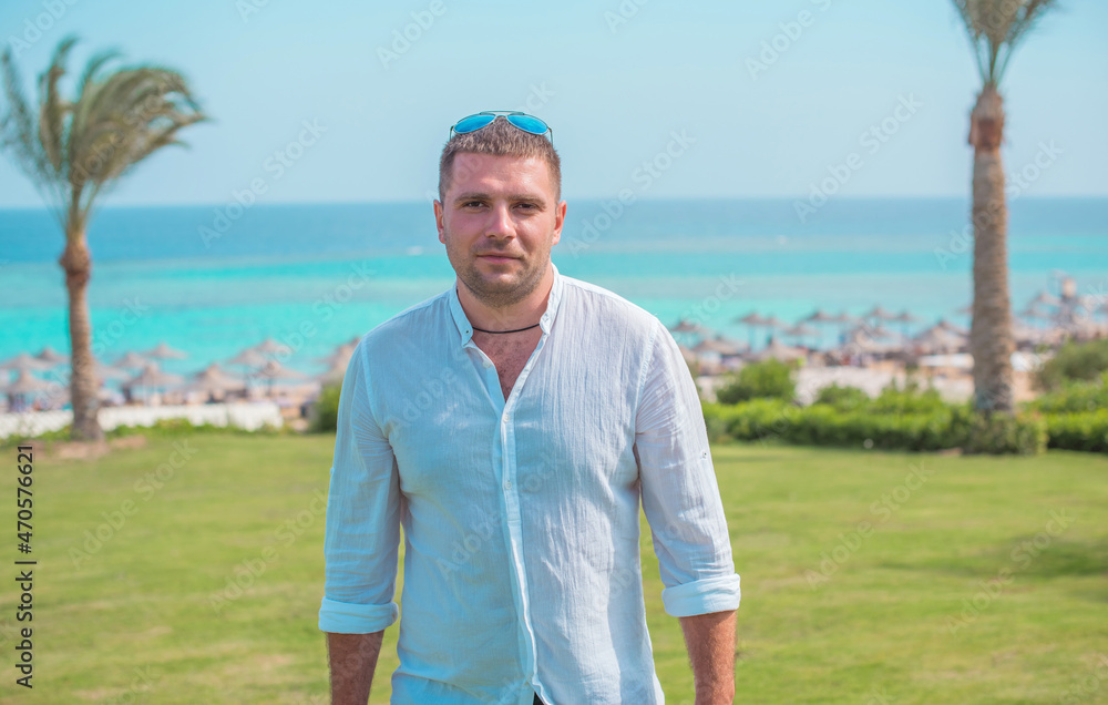 Men at beach in tranquility mood, rest in vacation. Summer portrait of ...