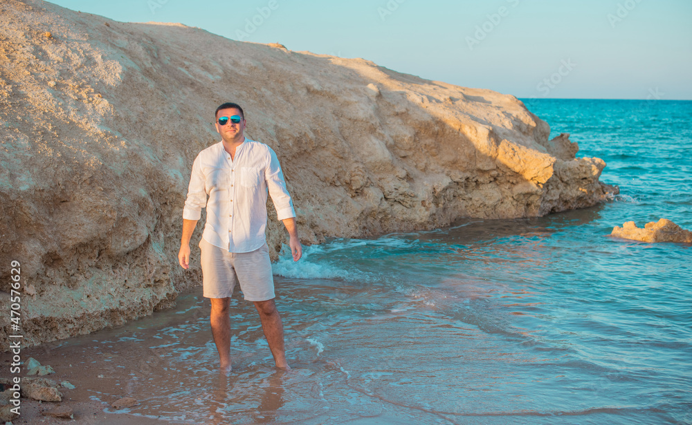 Men at beach in tranquility mood, rest in vacation. Summer portrait of ...