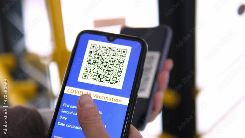 Reading a QR code using a smartphone. Using QR code to check COVID-19 ...