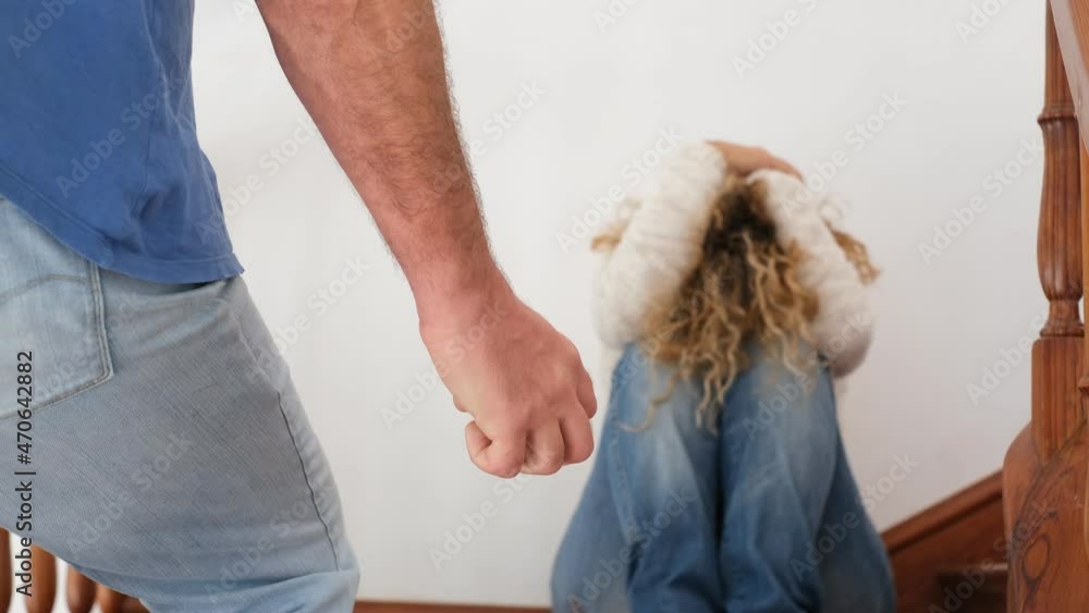 Angry man threatening intimidated woman Stock Video | Adobe Stock