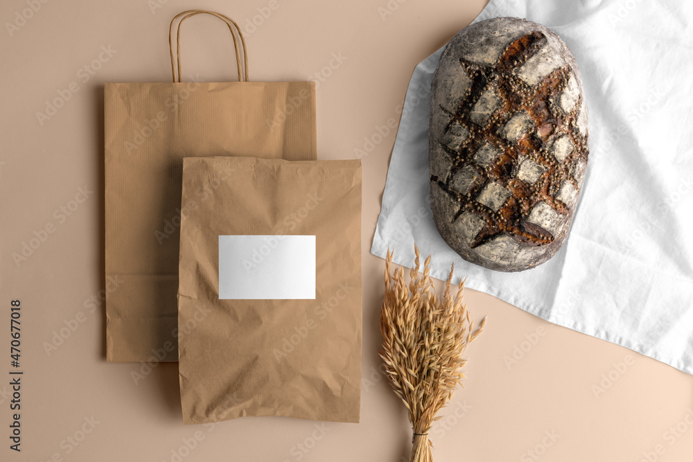 Craft paper blank shopping bags with bread, bakery branding mockup ...
