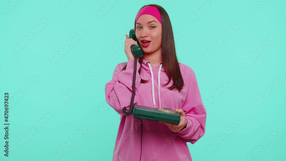 Hey you, call me back. Cheerful teen girl secretary in pink hoodie ...