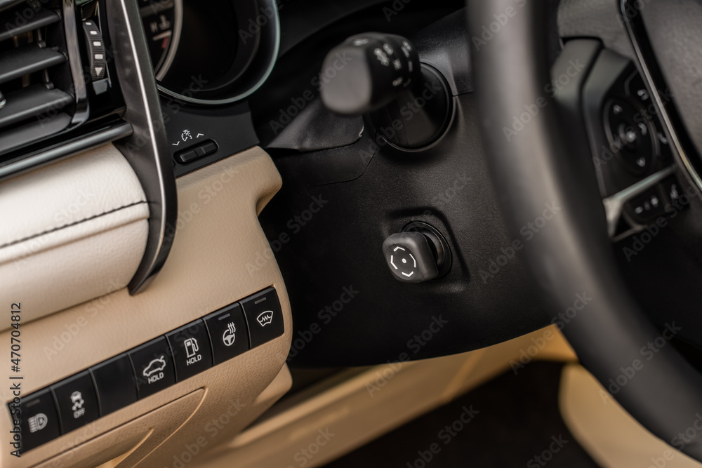 Adjustable steering wheel in modern car. Tilt and telescopic steering ...
