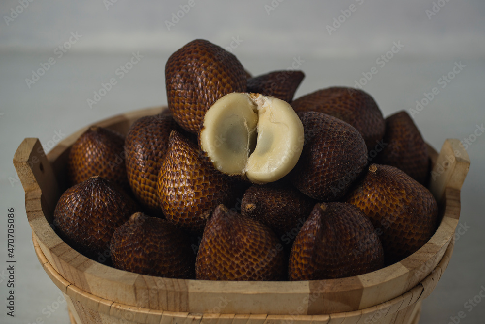 Indonesian native fruit, salak, also known as snake fruit, against ...