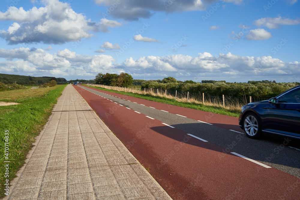 Road in the netherlands with traffic signs restricted stop. The road is ...