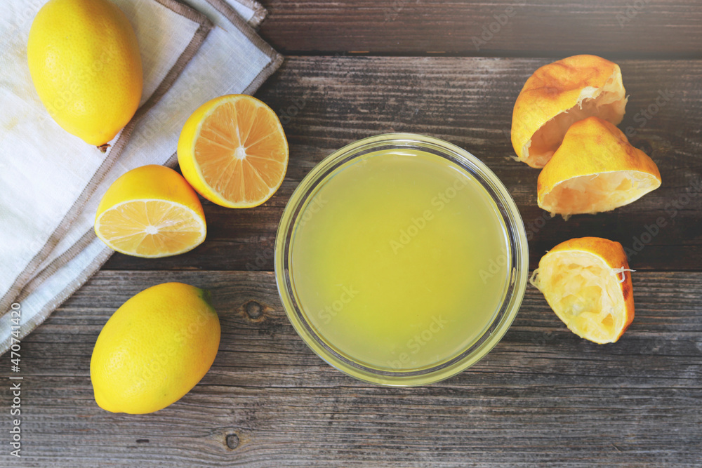 Freshly squeezed lemon juice in a small bowl. Top view. Stock Photo ...