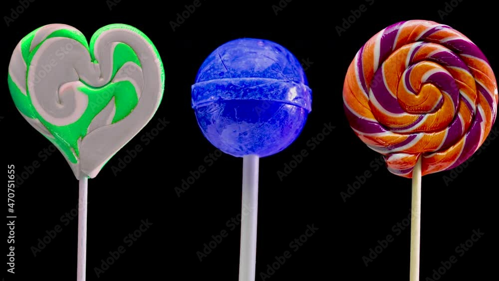Stop motion animation set of lollipops on a black background. Sweet ...