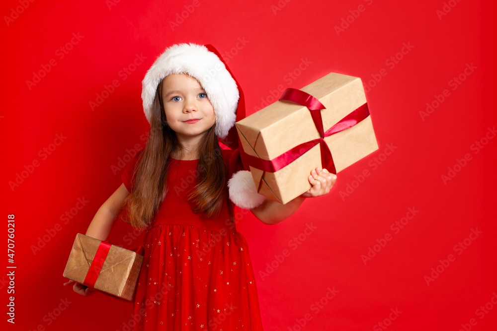 Merry Christmas and happy holidays. Portrait of a pending happy girl in ...