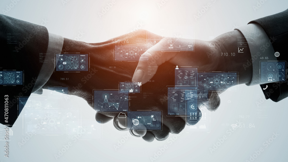 Business and technology concept. Shaking hands. GUI (Graphical User ...
