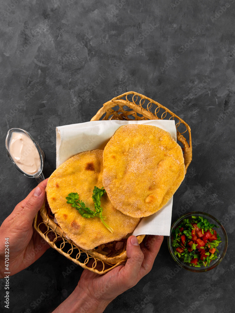 Homemade corn flatbread yogurt sauce cilantro greens tomato salsa ...