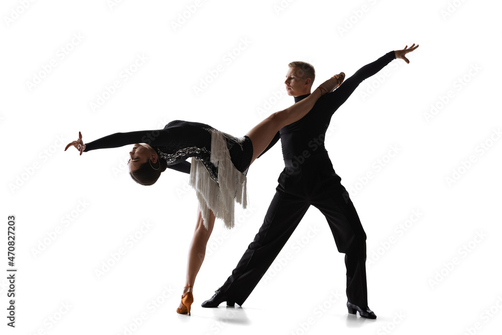 Two young graceful dancers, flexible man and woman dancing ballroom ...